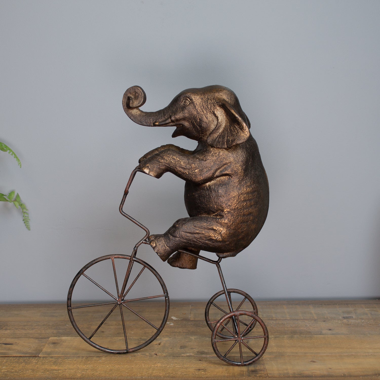 Elephant on Tricycle Sculpture | Resin & Metal Animal Ornament – Qurios